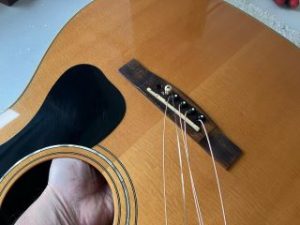 Re-stringing with bridge pins | Selborne Guitars